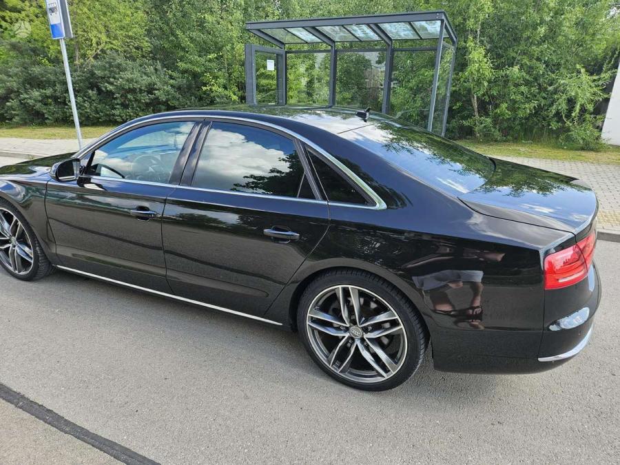 Black Audi A8 2011 in Telschi, with an engine capacity of 4.16 L and mileage of 238 thousand km for 12000 €, photo 4 on AUTOMOTO.COM.LV