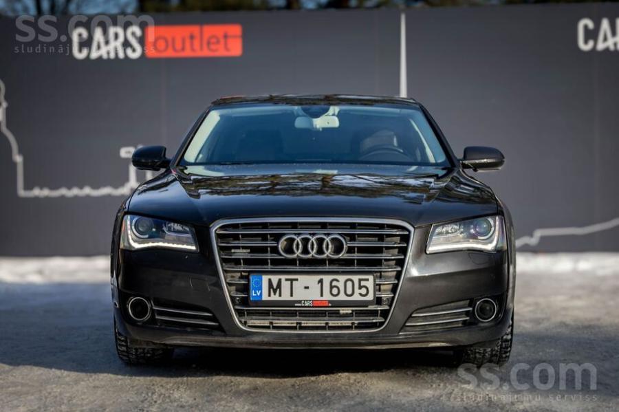 Black Audi A8 2011 in Riga, with an engine capacity of 3.00 L and mileage of 315 thousand km for 12990 €, photo 2 on AUTOMOTO.COM.LV