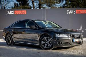 Black Audi A8 2011 in Riga, with an engine capacity of 3.00 L and mileage of 315 thousand km for 12990 €, photo 3 on AUTOMOTO.COM.LV