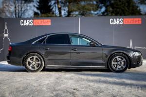 Black Audi A8 2011 in Riga, with an engine capacity of 3.00 L and mileage of 315 thousand km for 12990 €, photo 4 on AUTOMOTO.COM.LV