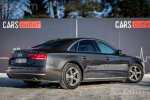 Black Audi A8 2011 in Riga, with an engine capacity of 3.00 L and mileage of 315 thousand km for 12990 €, photo 7 on AUTOMOTO.COM.LV