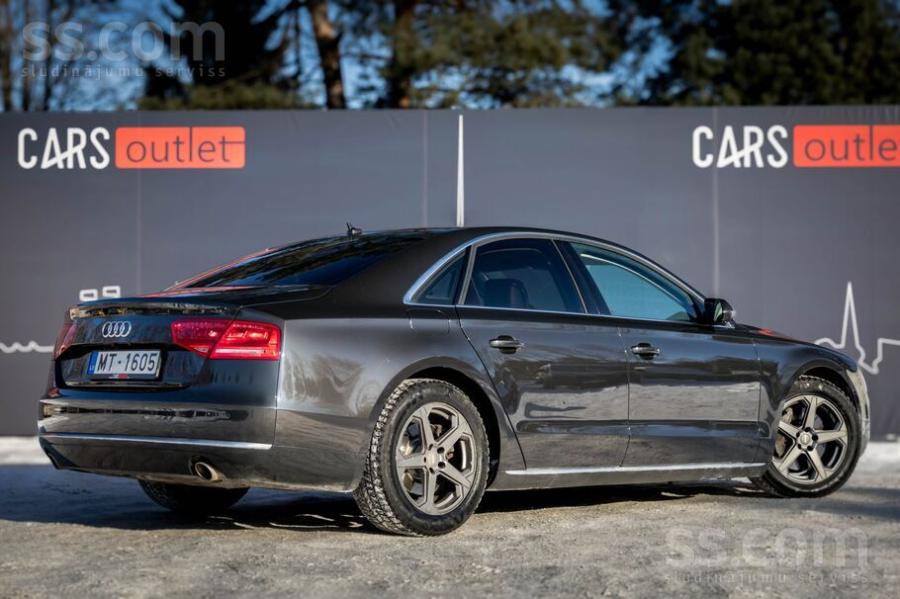 Black Audi A8 2011 in Riga, with an engine capacity of 3.00 L and mileage of 315 thousand km for 12990 €, photo 7 on AUTOMOTO.COM.LV