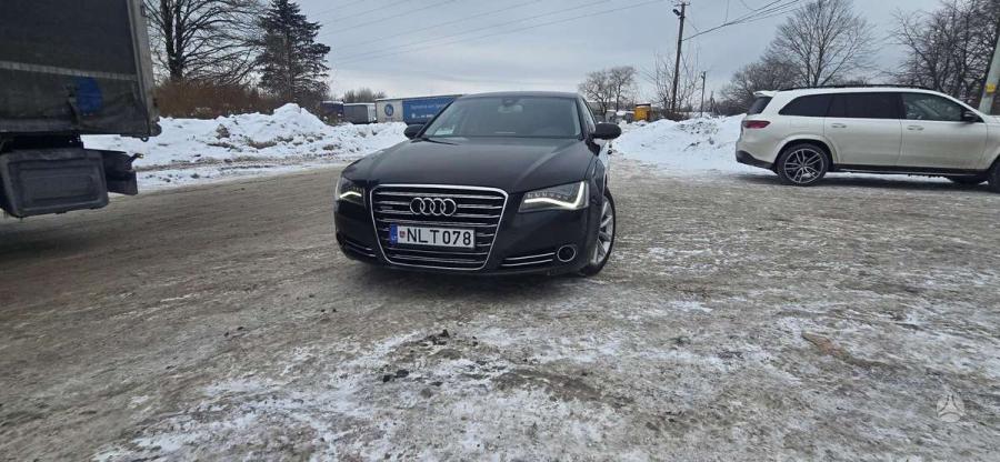 Melns Audi A8 2011 Viļņa, ar dzinēja tilpumu 4.13 L un nobraukumu 370 tūkst. km par 11500 €, foto 1 vietnē AUTOMOTO.COM.LV