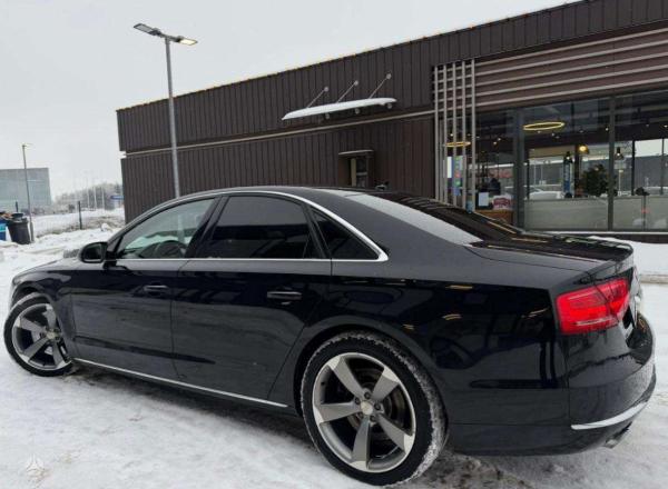 Black Audi A8 2011 in Vilnius, with an engine capacity of 4.20 L and mileage of 339 thousand km for 8250 €, photo 1 on AUTOMOTO.COM.LV