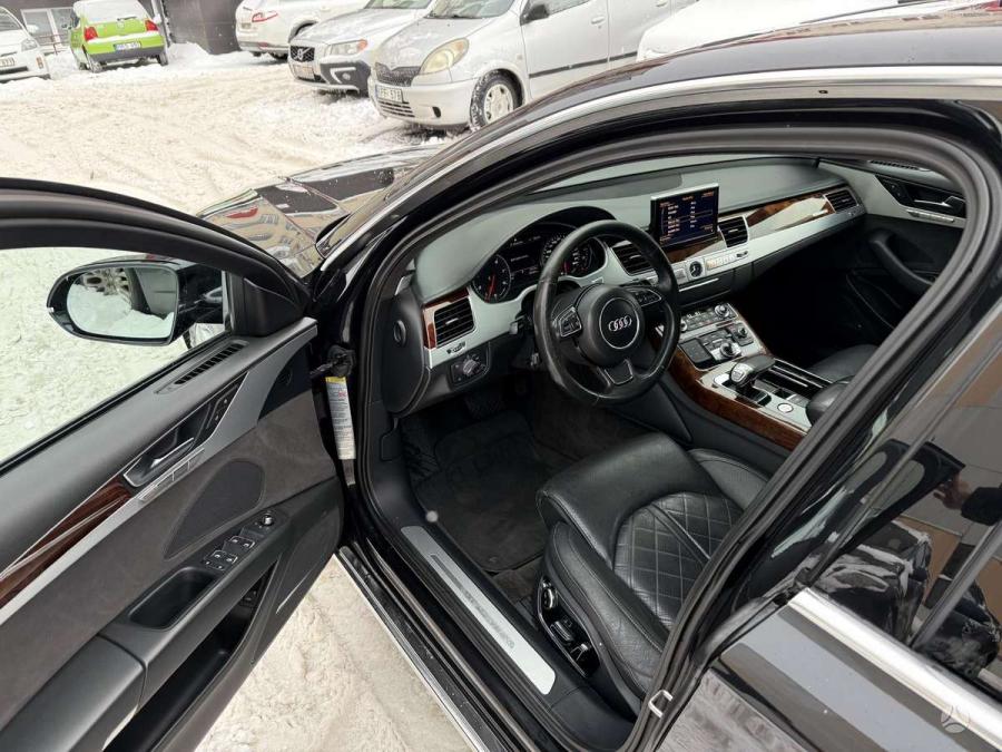 Black Audi A8 2011 in Vilnius, with an engine capacity of 4.16 L and mileage of 300 thousand km for 9400 €, photo 9 on AUTOMOTO.COM.LV