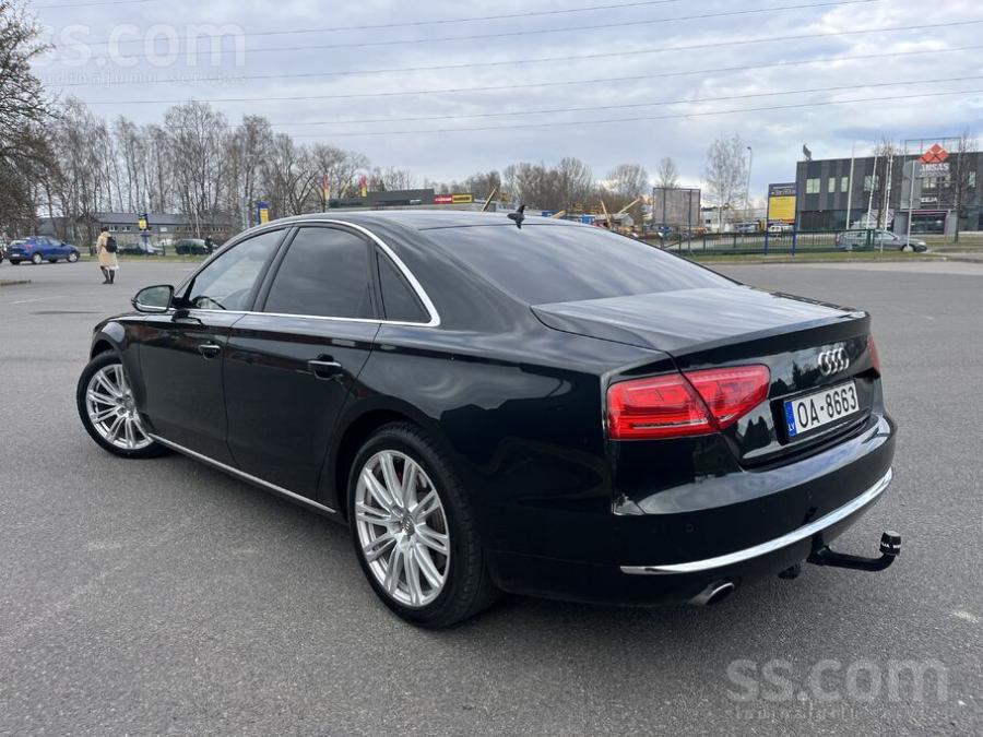 Black Audi A8 2011 in Riga, with an engine capacity of 4.20 L and mileage of 194 thousand km for 16490 €, photo 6 on AUTOMOTO.COM.LV