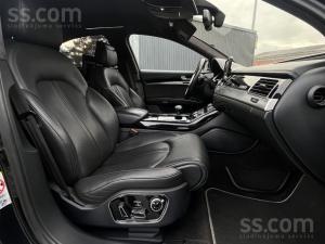 Black Audi A8 2011 in Riga, with an engine capacity of 4.20 L and mileage of 194 thousand km for 16490 €, photo 11 on AUTOMOTO.COM.LV