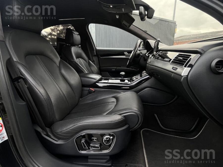 Black Audi A8 2011 in Riga, with an engine capacity of 4.20 L and mileage of 194 thousand km for 16490 €, photo 11 on AUTOMOTO.COM.LV