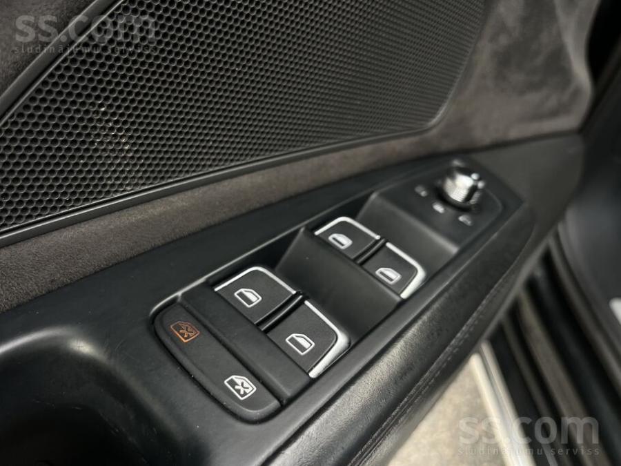 Black Audi A8 2011 in Riga, with an engine capacity of 4.20 L and mileage of 194 thousand km for 16490 €, photo 13 on AUTOMOTO.COM.LV