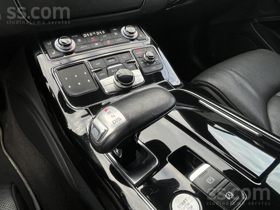 Black Audi A8 2011 in Riga, with an engine capacity of 4.20 L and mileage of 194 thousand km for 16490 €, photo 21 on AUTOMOTO.COM.LV