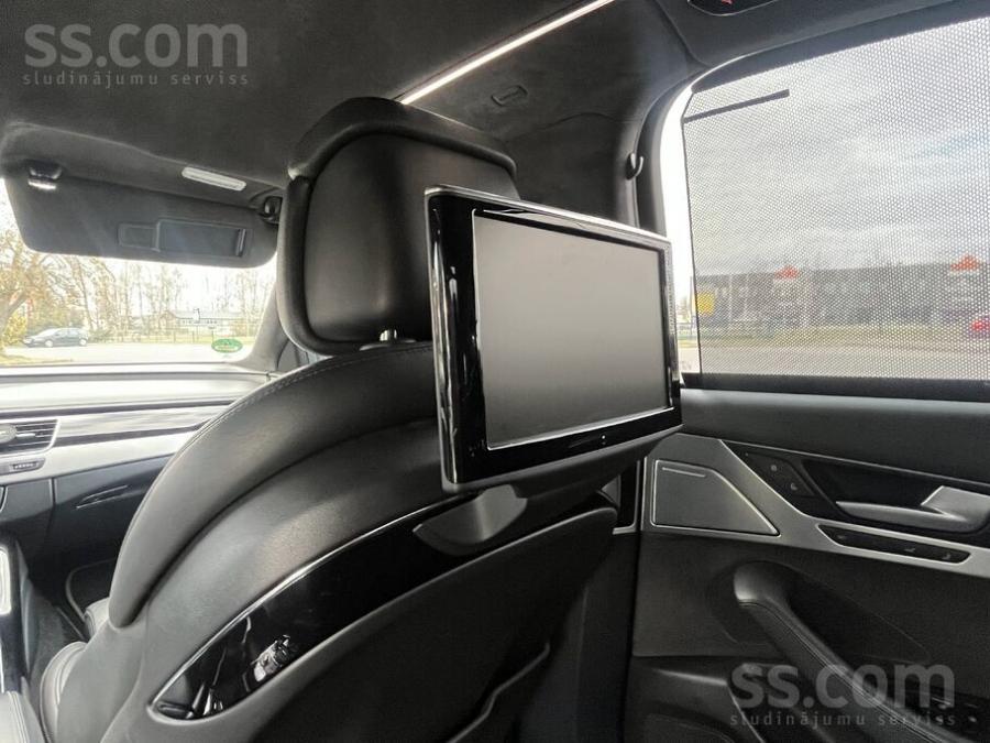 Black Audi A8 2011 in Riga, with an engine capacity of 4.20 L and mileage of 194 thousand km for 16490 €, photo 23 on AUTOMOTO.COM.LV