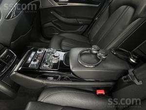 Black Audi A8 2011 in Riga, with an engine capacity of 4.20 L and mileage of 194 thousand km for 16490 €, photo 29 on AUTOMOTO.COM.LV