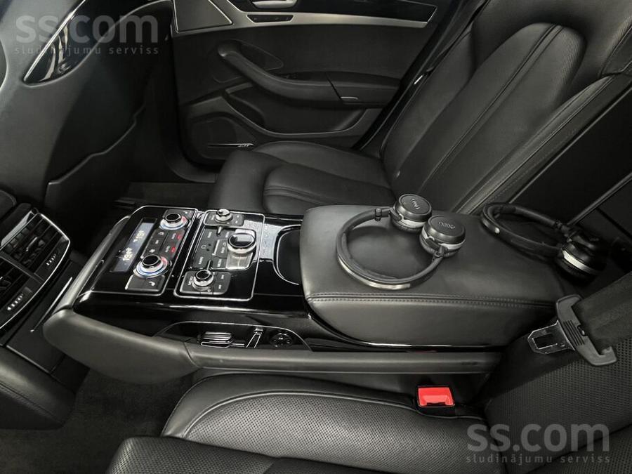 Black Audi A8 2011 in Riga, with an engine capacity of 4.20 L and mileage of 194 thousand km for 16490 €, photo 29 on AUTOMOTO.COM.LV