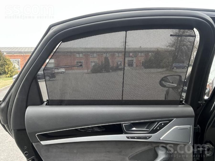 Black Audi A8 2011 in Riga, with an engine capacity of 4.20 L and mileage of 194 thousand km for 16490 €, photo 30 on AUTOMOTO.COM.LV