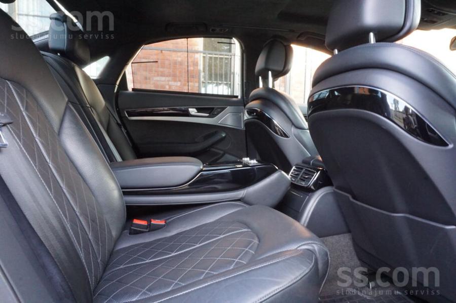 Black Audi A8 2011 in Riga, with an engine capacity of 4.20 L and mileage of 297 thousand km for 12700 €, photo 14 on AUTOMOTO.COM.LV