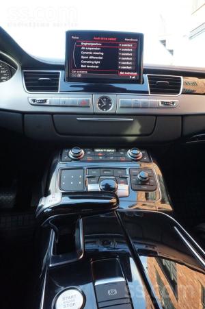 Black Audi A8 2011 in Riga, with an engine capacity of 4.20 L and mileage of 297 thousand km for 12700 €, photo 27 on AUTOMOTO.COM.LV