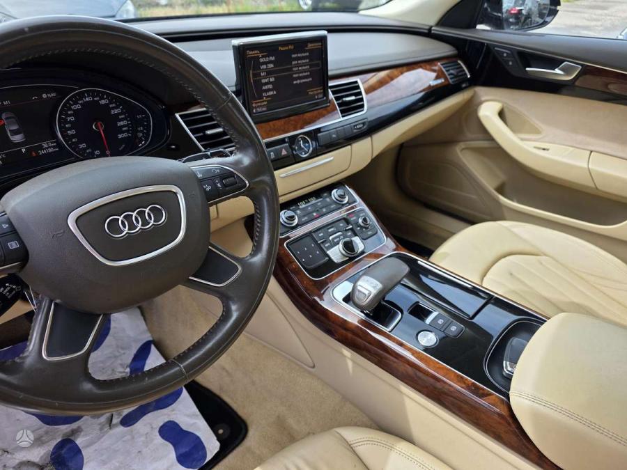 Black Audi A8 2011 in Siauliai, with an engine capacity of 2.97 L and mileage of 244 thousand km for 11000 €, photo 14 on AUTOMOTO.COM.LV