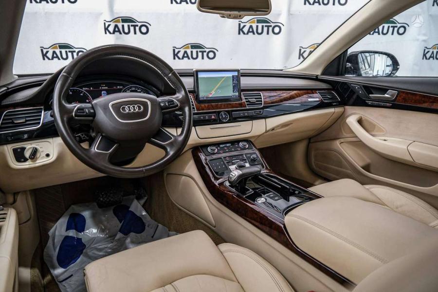 Black Audi A8 2011 in Kaunas, with an engine capacity of 4.20 L and mileage of 306 thousand km for 12890 €, photo 8 on AUTOMOTO.COM.LV