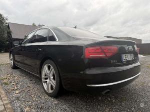 Black Audi A8 2011 in Vilnius, with an engine capacity of 4.16 L and mileage of 298 thousand km for 10999 €, photo 8 on AUTOMOTO.COM.LV