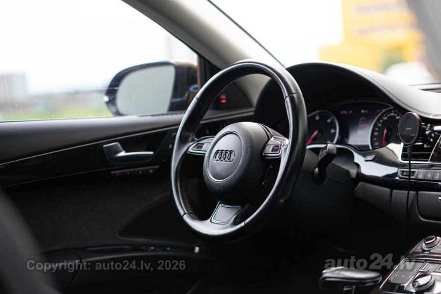 Black Audi A8 2011 in Tallinn, with an engine capacity of 3.00 L and mileage of 223 thousand km for 15500 €, photo 17 on AUTOMOTO.COM.LV