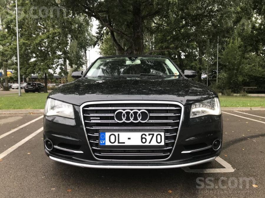 Black Audi A8 2011 in Riga, with an engine capacity of 3.00 L and mileage of 340 thousand km for 12500 €, photo 3 on AUTOMOTO.COM.LV