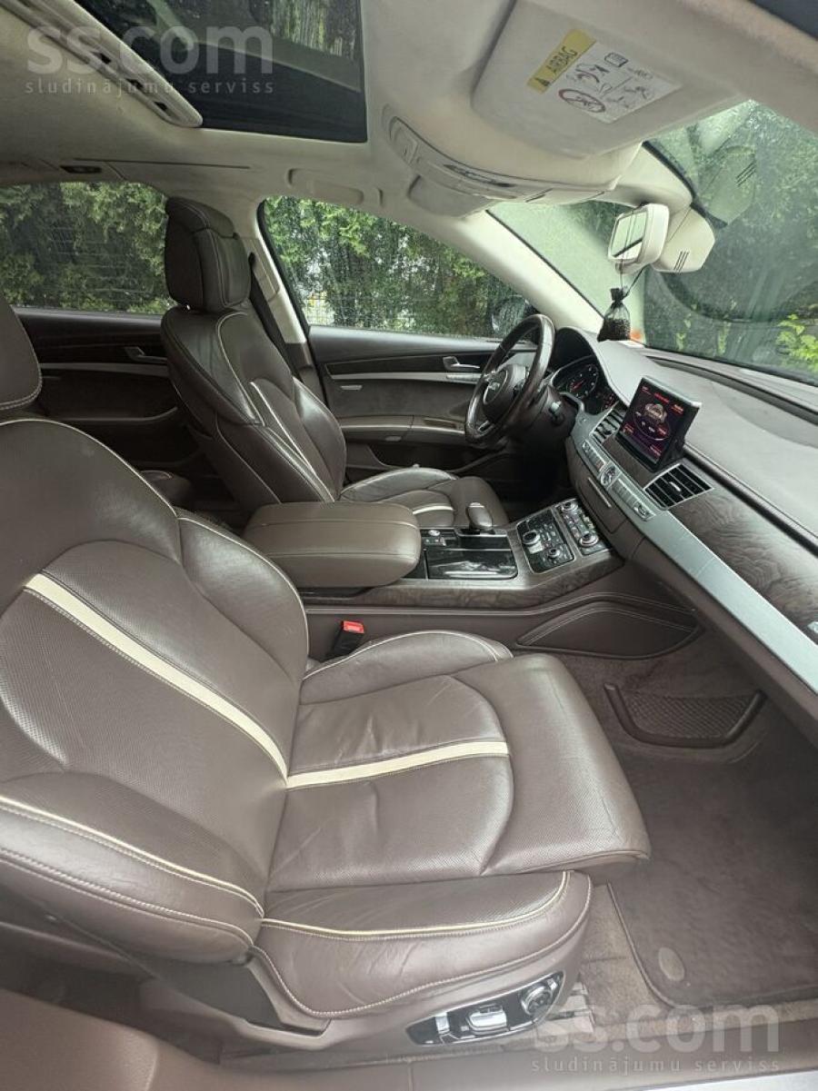 Black Audi A8 2011 in Riga, with an engine capacity of 3.00 L and mileage of 340 thousand km for 12500 €, photo 11 on AUTOMOTO.COM.LV