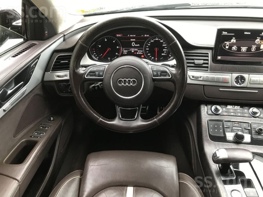 Black Audi A8 2011 in Riga, with an engine capacity of 3.00 L and mileage of 340 thousand km for 12500 €, photo 14 on AUTOMOTO.COM.LV