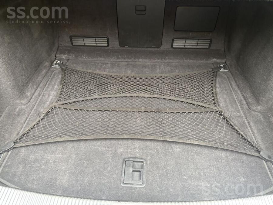 Black Audi A8 2011 in Riga, with an engine capacity of 3.00 L and mileage of 340 thousand km for 12500 €, photo 24 on AUTOMOTO.COM.LV