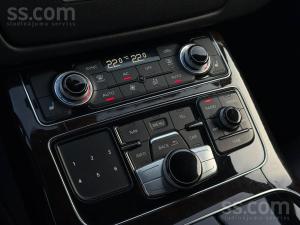 Black Audi A8 2011 in Riga, with an engine capacity of 3.00 L and mileage of 285 thousand km for 8990 €, photo 21 on AUTOMOTO.COM.LV