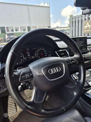 Black Audi A8 2011 in Siauliai, with an engine capacity of 2.97 L and mileage of 391 thousand km for 10500 €, photo 13 on AUTOMOTO.COM.LV