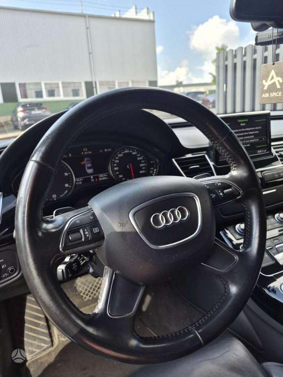 Black Audi A8 2011 in Siauliai, with an engine capacity of 2.97 L and mileage of 391 thousand km for 10500 €, photo 13 on AUTOMOTO.COM.LV