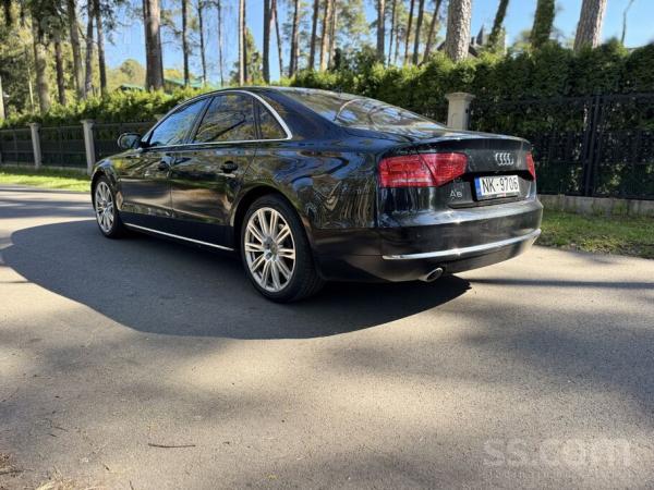 Black Audi A8 2012 in Kuldiga, with an engine capacity of 3.00 L and mileage of 330 thousand km for 13990 €, photo 1 on AUTOMOTO.COM.LV