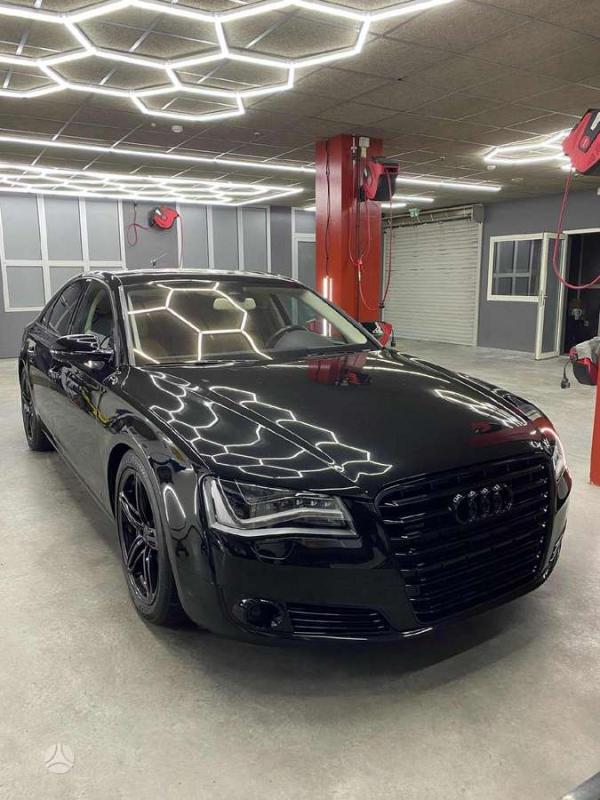 Black Audi A8 2012 in Klaipeda, with an engine capacity of 4.20 L and mileage of 172 thousand km for 11300 €, photo 1 on AUTOMOTO.COM.LV