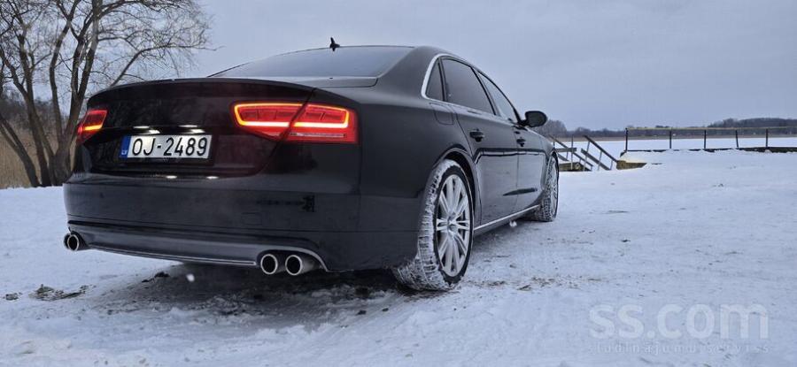 Black Audi A8 2012 in Riga, with an engine capacity of 3.00 L and mileage of 205 thousand km for 18900 €, photo 1 on AUTOMOTO.COM.LV