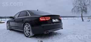 Black Audi A8 2012 in Riga, with an engine capacity of 3.00 L and mileage of 205 thousand km for 18900 €, photo 2 on AUTOMOTO.COM.LV