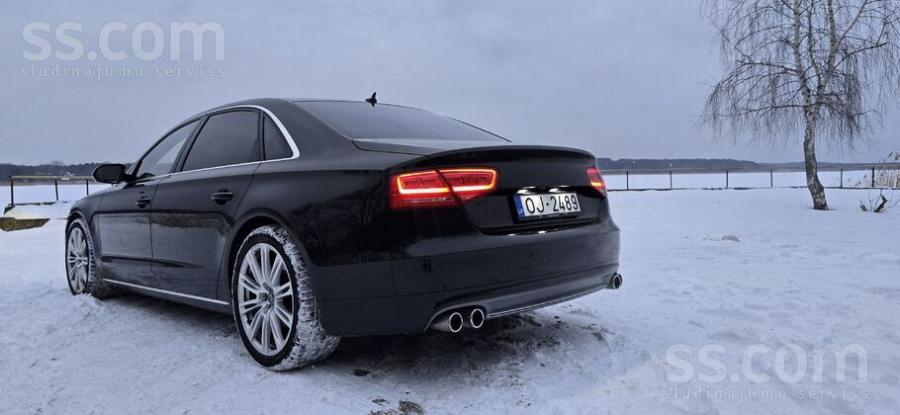 Black Audi A8 2012 in Riga, with an engine capacity of 3.00 L and mileage of 205 thousand km for 18900 €, photo 2 on AUTOMOTO.COM.LV