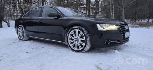 Black Audi A8 2012 in Riga, with an engine capacity of 3.00 L and mileage of 205 thousand km for 18900 €, photo 4 on AUTOMOTO.COM.LV