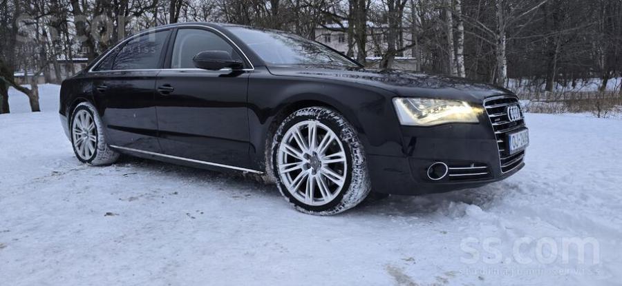 Black Audi A8 2012 in Riga, with an engine capacity of 3.00 L and mileage of 205 thousand km for 18900 €, photo 4 on AUTOMOTO.COM.LV