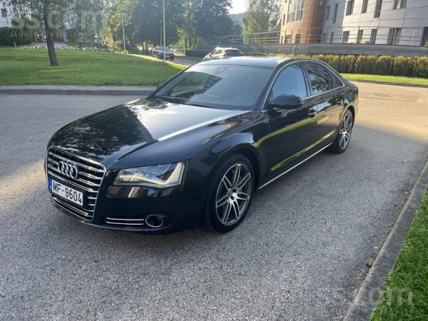 Black Audi A8 2012 in Riga, with an engine capacity of 4.20 L and mileage of 259 thousand km for 13100 €, photo 2 on AUTOMOTO.COM.LV
