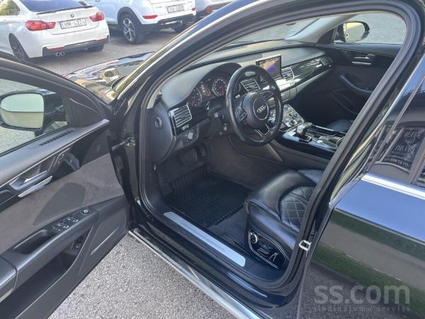 Black Audi A8 2012 in Riga, with an engine capacity of 4.20 L and mileage of 259 thousand km for 13100 €, photo 6 on AUTOMOTO.COM.LV