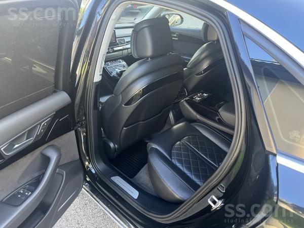 Black Audi A8 2012 in Riga, with an engine capacity of 4.20 L and mileage of 259 thousand km for 13100 €, photo 7 on AUTOMOTO.COM.LV