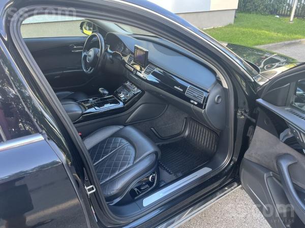 Black Audi A8 2012 in Riga, with an engine capacity of 4.20 L and mileage of 259 thousand km for 13100 €, photo 8 on AUTOMOTO.COM.LV