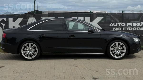 Black Audi A8 2012 in Liepaja, with an engine capacity of 3.00 L and mileage of 349 thousand km for 13850 €, photo 3 on AUTOMOTO.COM.LV