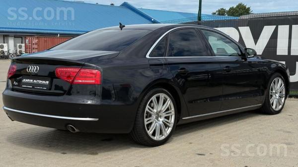 Black Audi A8 2012 in Liepaja, with an engine capacity of 3.00 L and mileage of 349 thousand km for 13850 €, photo 4 on AUTOMOTO.COM.LV