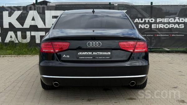 Black Audi A8 2012 in Liepaja, with an engine capacity of 3.00 L and mileage of 349 thousand km for 13850 €, photo 5 on AUTOMOTO.COM.LV