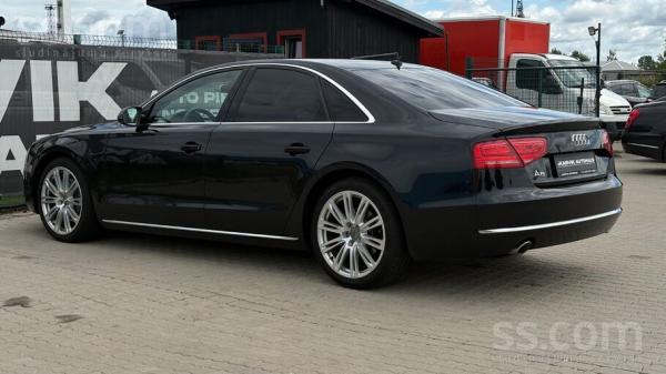 Black Audi A8 2012 in Liepaja, with an engine capacity of 3.00 L and mileage of 349 thousand km for 13850 €, photo 6 on AUTOMOTO.COM.LV
