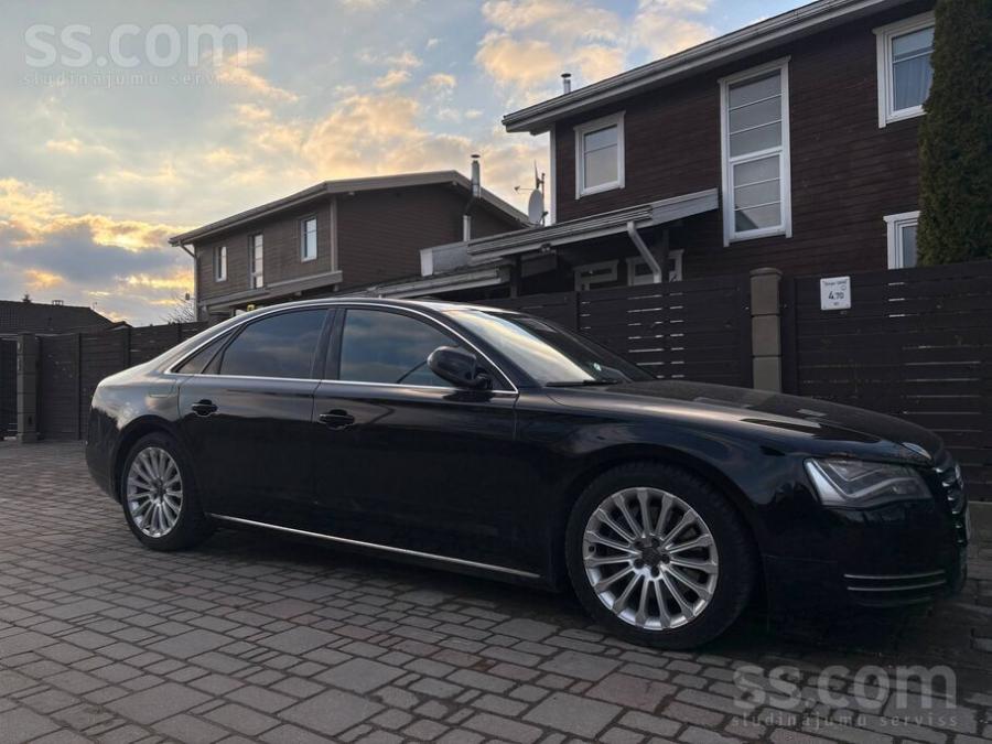 Black Audi A8 2012 in Riga, with an engine capacity of 3.00 L and mileage of 348 thousand km for 13900 €, photo 1 on AUTOMOTO.COM.LV
