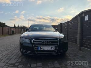 Black Audi A8 2012 in Riga, with an engine capacity of 3.00 L and mileage of 348 thousand km for 13900 €, photo 3 on AUTOMOTO.COM.LV