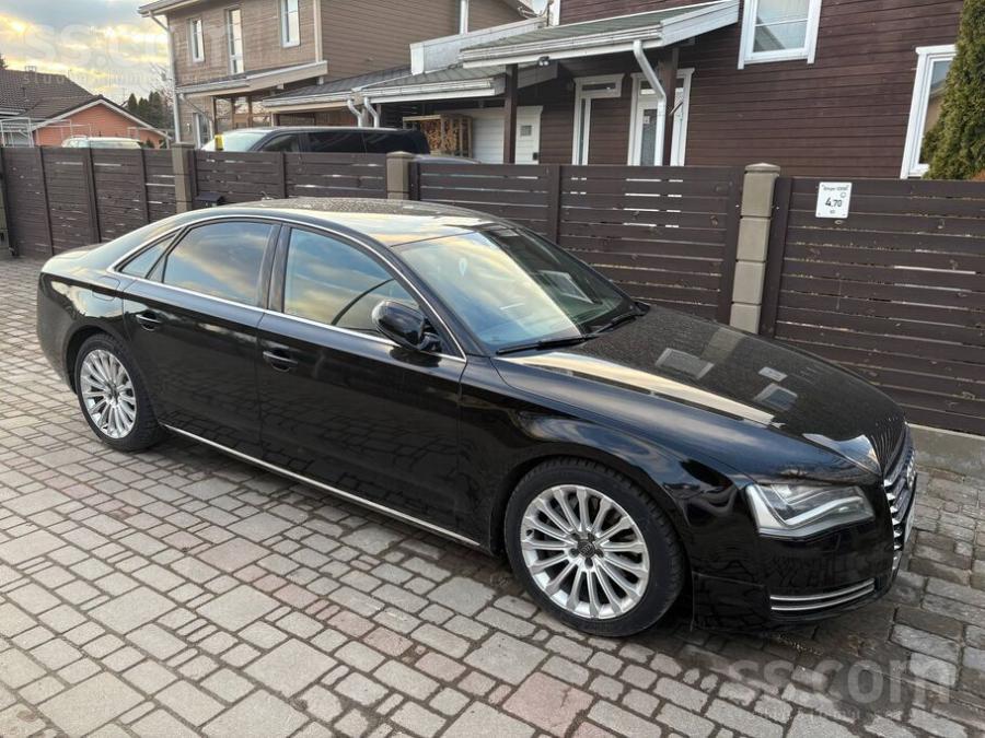 Black Audi A8 2012 in Riga, with an engine capacity of 3.00 L and mileage of 348 thousand km for 13900 €, photo 5 on AUTOMOTO.COM.LV