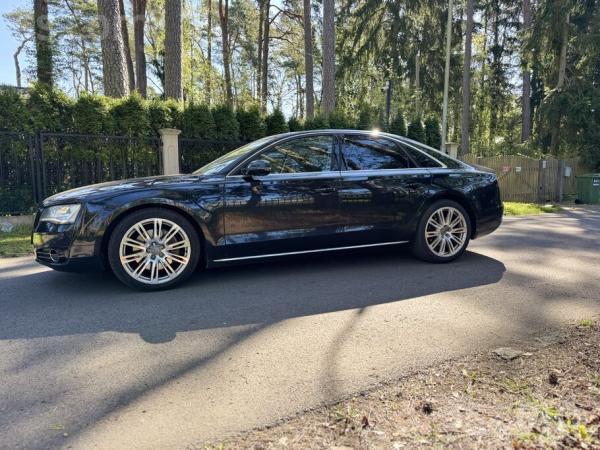 Black Audi A8 2012 in Kuldiga, with an engine capacity of 3.00 L and mileage of 348 thousand km for 11500 €, photo 4 on AUTOMOTO.COM.LV